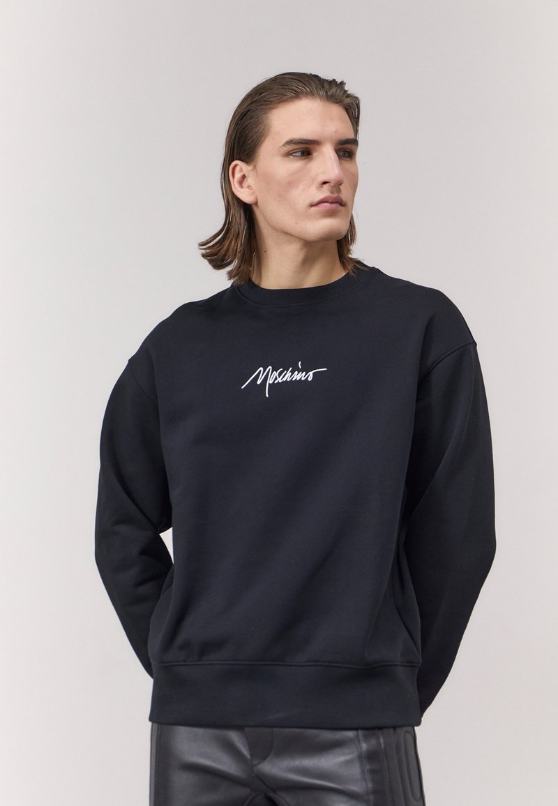 MOSCHINO Pusa - black/must - Zalando.ee