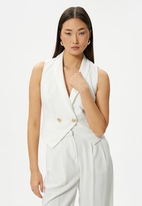 Koton POCKET DETAIL BUTTONED DOUBLE BREASTED - Chaleco - off white/crema - Zalando.es