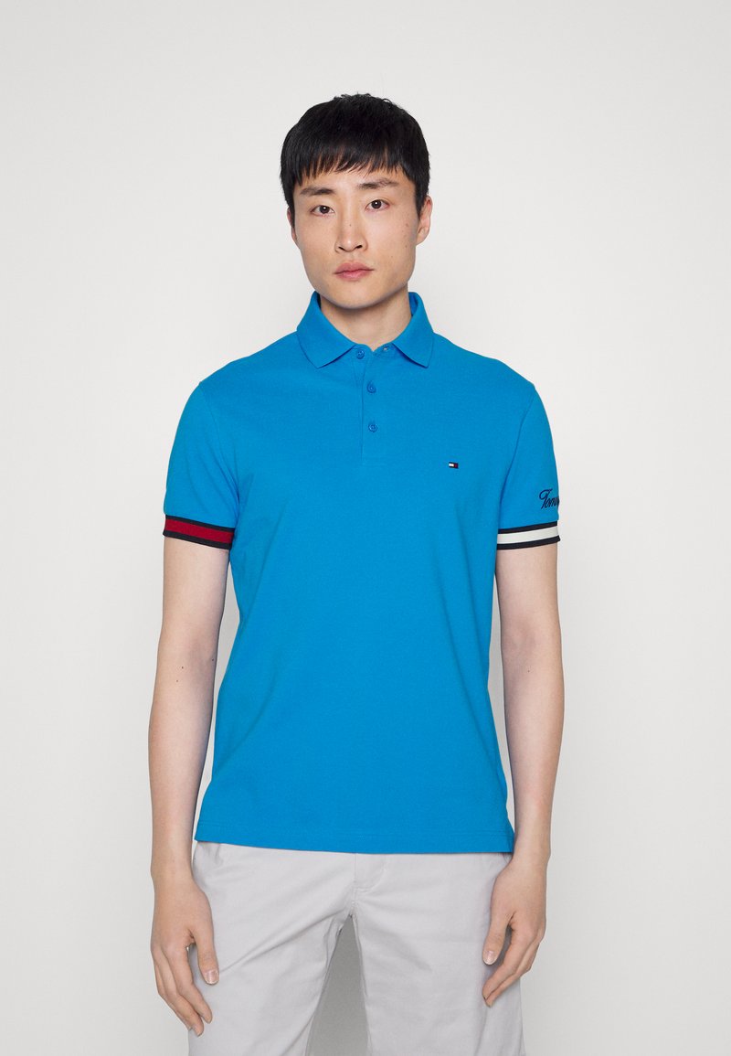 Tommy Hilfiger FLAG CUFF - Polo shirt - shocking blue/blue - Zalando.ie