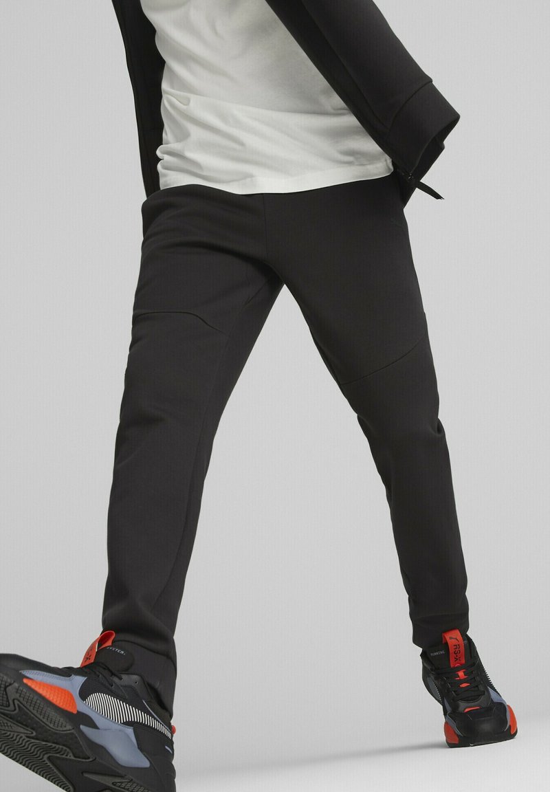 Puma TECH DK JOGGING - Jogginghose - black/schwarz - Zalando.ch