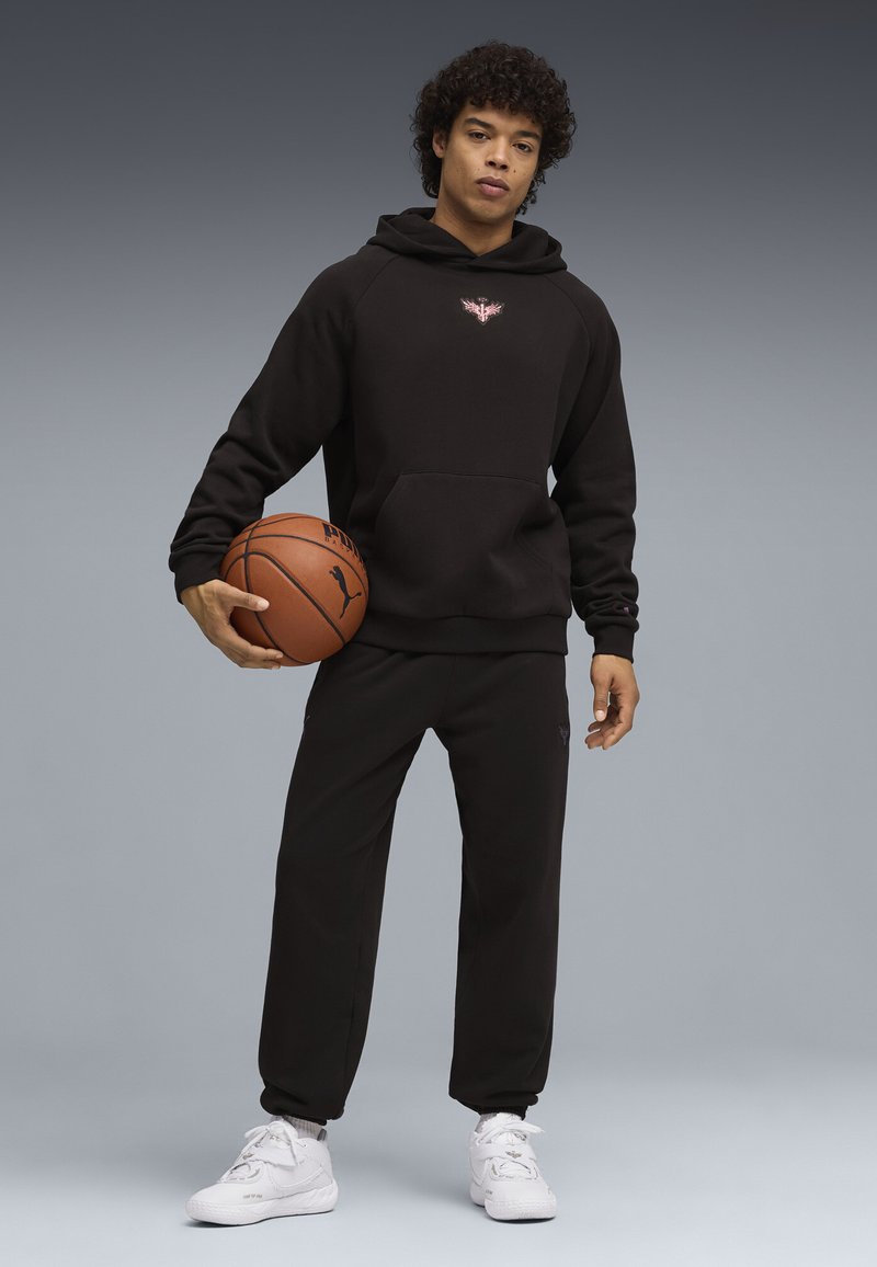 Puma MELO ALWAYZ ON - Tracksuit bottoms - puma black-glowing red/black ...