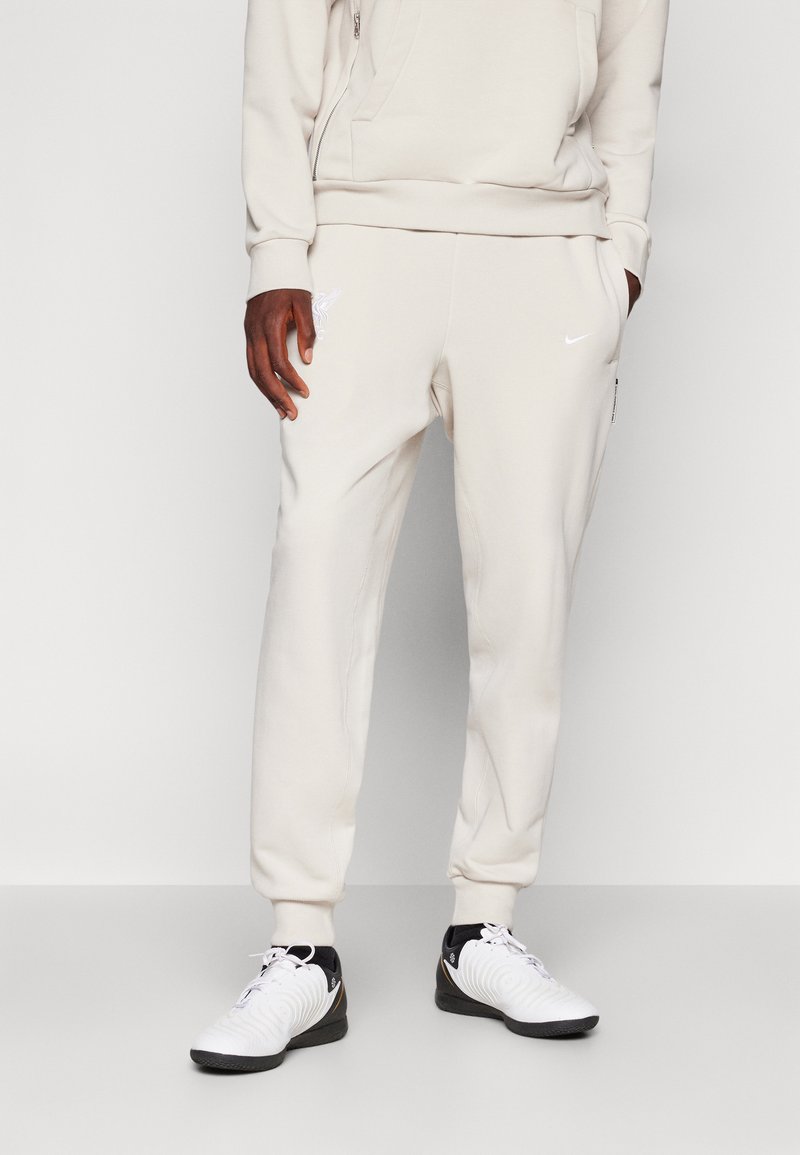 Nike Performance LIVERPOOL FC NIKE TAPER PANTS - Club wear - light ...