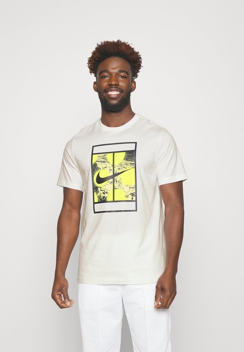 Nike Performance TEE HERITAGE - Print T-shirt - white - Zalando.co.uk