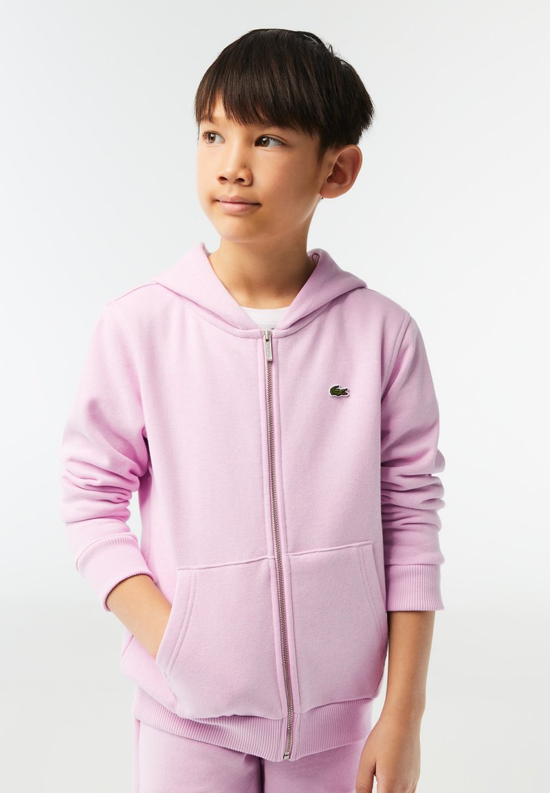 Lacoste SPORTS JUMPER UNISEX - Sweater met rits - reseda pink ...
