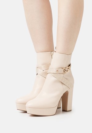 Marco Tozzi Botines con plataforma - cream/gold/crema - Zalando.es