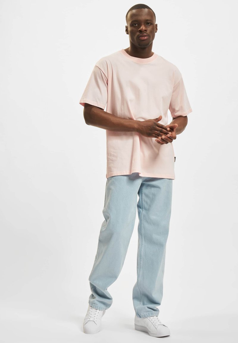 Karl Kani Jeans Relaxed Fit - bleached blue/blau - Zalando.de