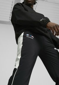 Puma BMW M MOTORSPORT MT7 SLIM JOGGING - Tracksuit bottoms - black ...