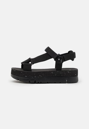 Crocs BROOKLYN LUXE GLADIATOR - Platform sandals - black - Zalando.co.uk
