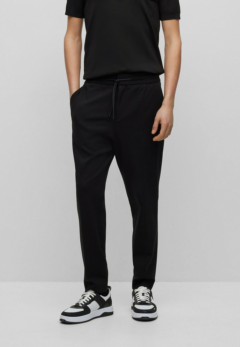 HUGO HOWARD - Pantalon de survêtement - black one/noir - ZALANDO.BE