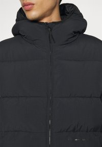 Champion Rochester OUTDOOR HOODED JACKET - Winterjacke - black/schwarz - Zalando.de