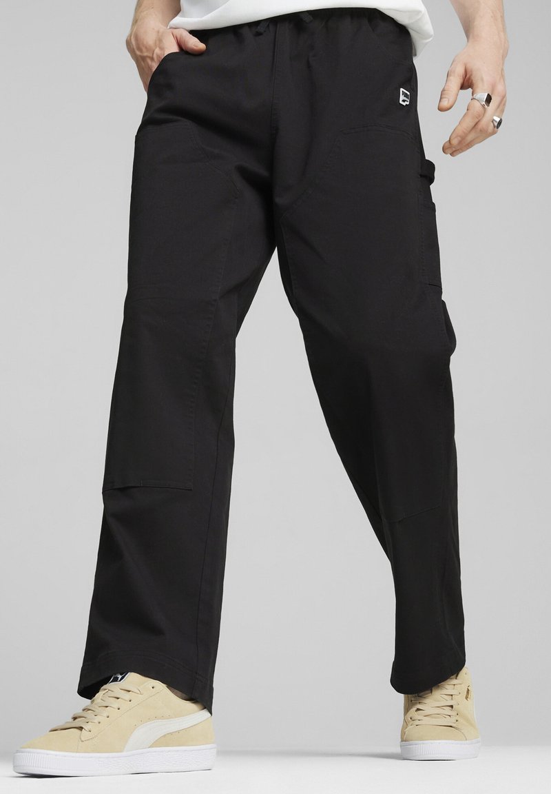 Puma DOWNTOWN MIT KNIEPARTIE - Trousers - black - Zalando.ie