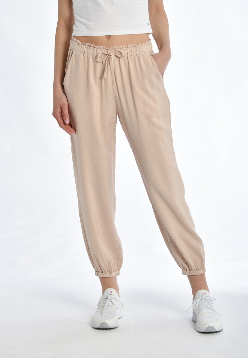 Deha SHINY JOGGER - Trousers - shell rose/mottled light pink - Zalando