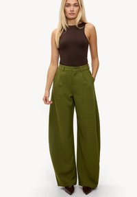 LOAVIES ENDLESS ADVENTURE - Trousers - solid green dark/dark green ...