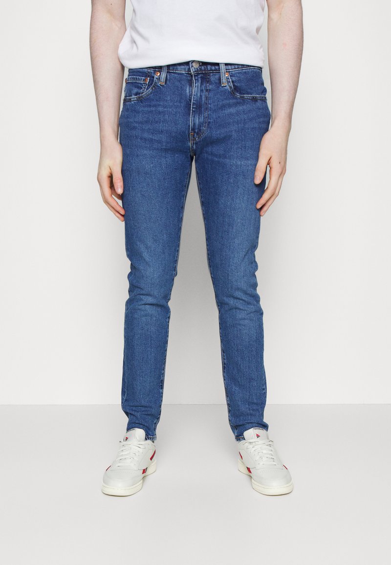 Levi's® 512™ SLIM TAPER - Slim fit jeans - midtown/dark-blue denim ...