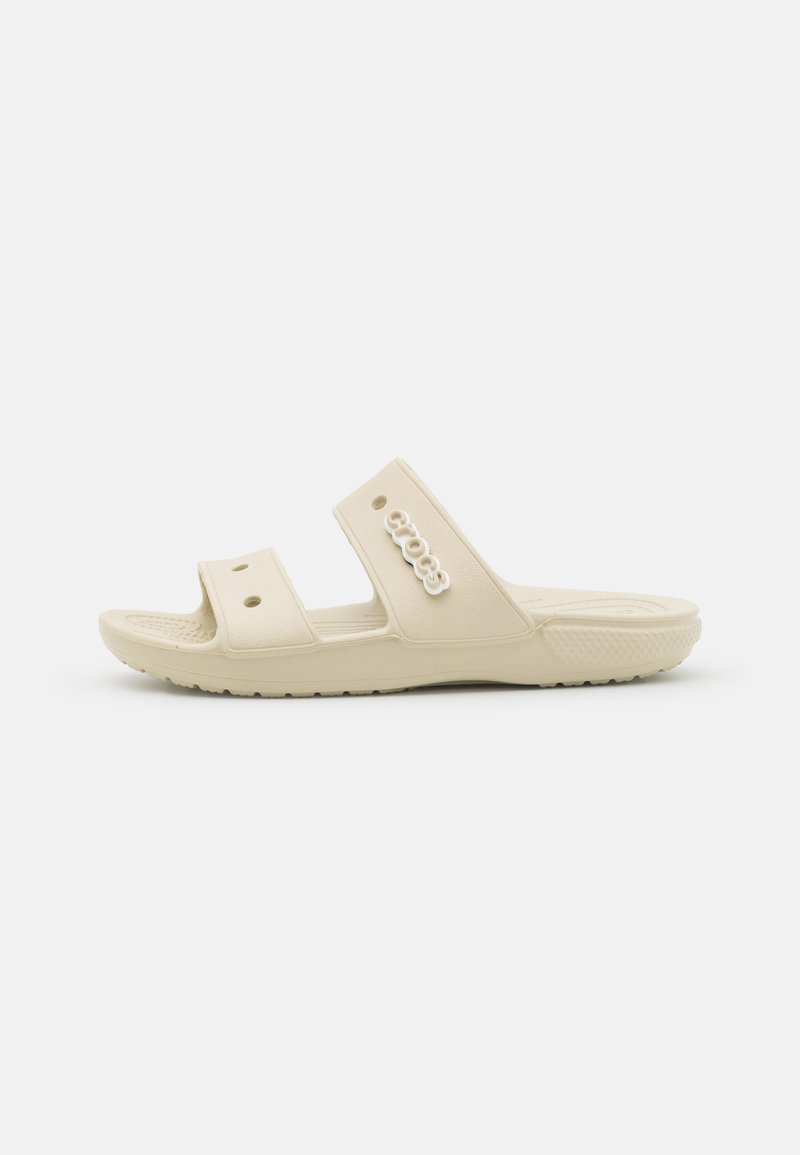 Crocs CLASSIC UNISEX - Pool slides - bone/off-white - Zalando.ie