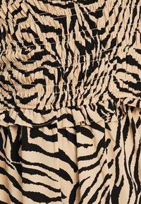 CALLI JENNI - Overall / Jumpsuit - beige tiger/nude - Zalando.se