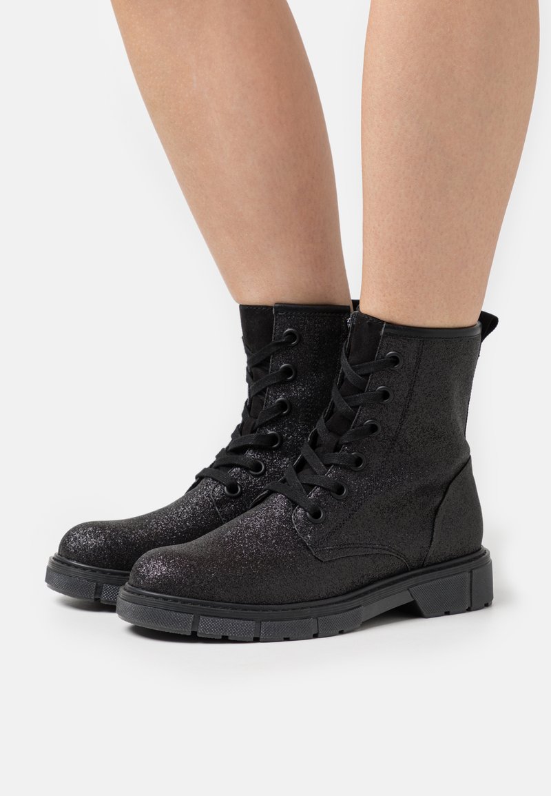 Marco Tozzi 2-25282-41 - Platform ankle boots - black/metallic black ...