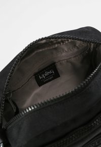 Kipling JENERA MINI - Umhängetasche - rich black/schwarz - Zalando.at