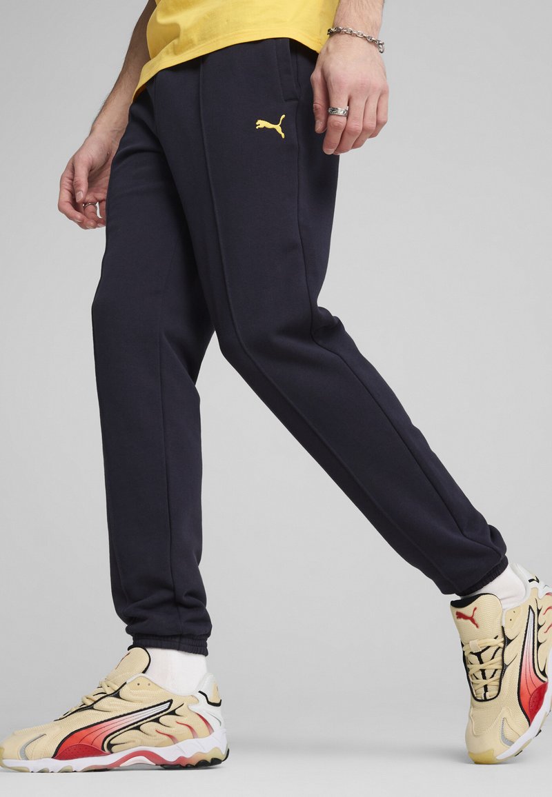 Puma ROAD TO UNITY - Pantalones deportivos - new navy/azul - Zalando.es