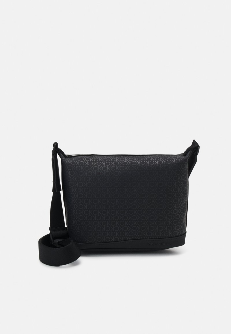 Calvin Klein RUBBERIZED WIDE BASE - Across body bag - black/black ...
