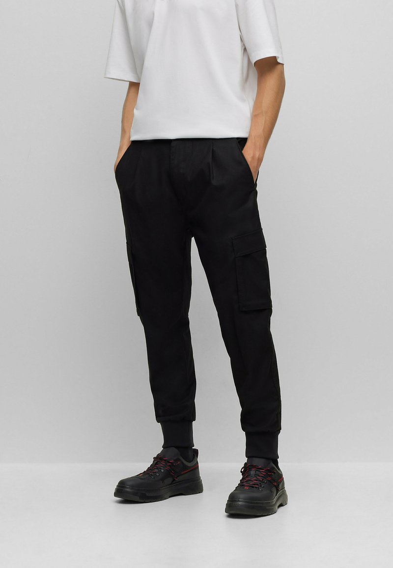 HUGO GLAVIN - Cargo trousers - schwarz eins/black - Zalando.co.uk