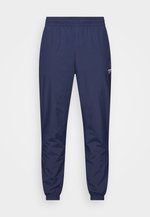 Reebok Classic TRACKPANT UNISEX - Tracksuit bottoms - vector navy/dark blue - Zalando.co.uk