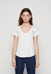 Abercrombie & Fitch ICON V NECK 3 PACK - T-Shirt basic - white/dark blue/light pink/weiß ...