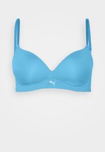 Puma WOMEN SOFT PADDED BRA - Podprsenka pod tričko - regal blue/modrá ...