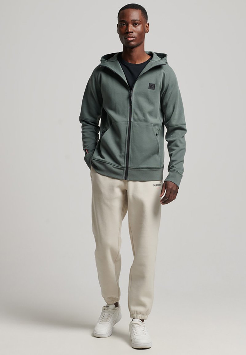 Superdry CODE TECH ZIP HOODIE - Sudadera con cremallera - balsam green ...