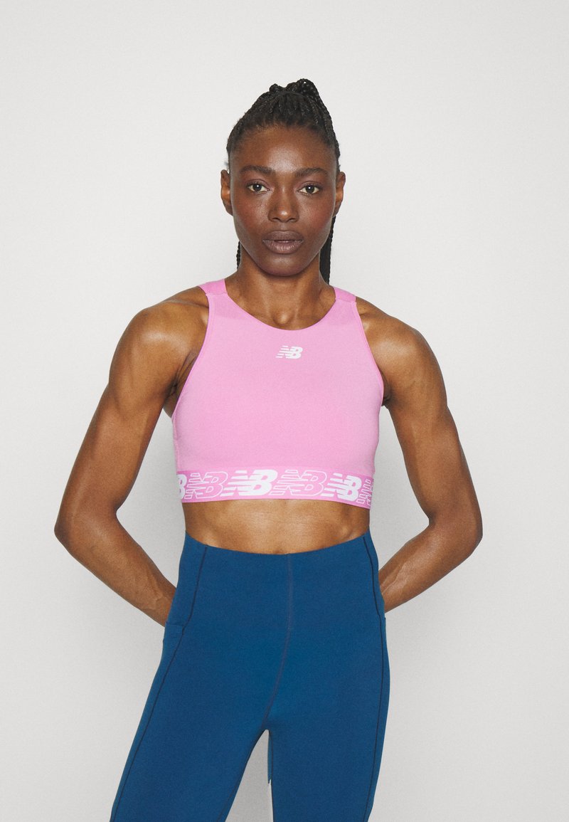 New Balance RELENTLESS CROP BRA - Medium support sports bra - raspberry ...