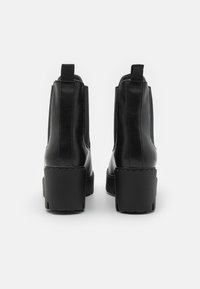 Koi Footwear ORSON SWITCH CHELSEA BOOTS - Enkellaarsjes met plateauzool ...