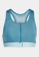 Nike Performance NIKE SWOOSH WOMEN'S MEDIUM-SUPPORT PADDED ZIP-FRONT ...