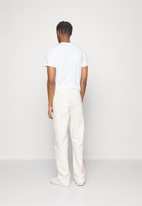 FRAME THE BOXY - Jeans Relaxed Fit - ecru spray/offwhite - Zalando.at