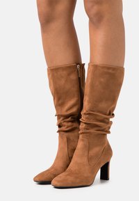 Tamaris High heeled boots - cognac - (Pre-owned) - Zalando