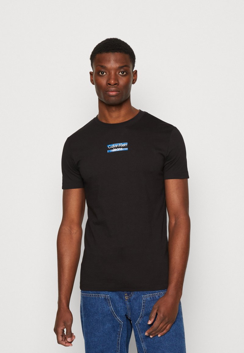 Calvin Klein Jeans TRANSPARENT STRIPE LOGO TEE - T-shirts med print ...