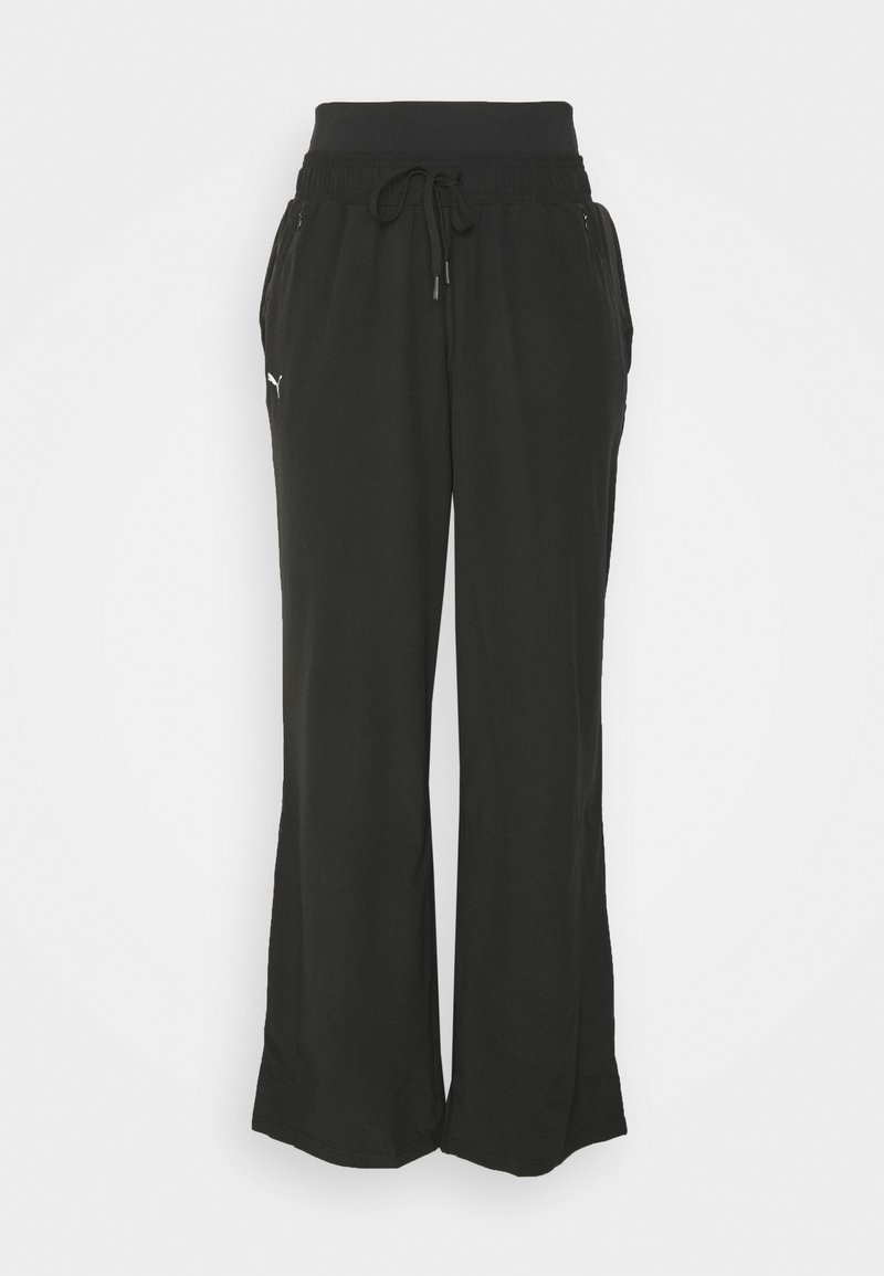 Puma MODEST ACTIVEWEAR WIDE LEG PANT - Tracksuit bottoms - black ...