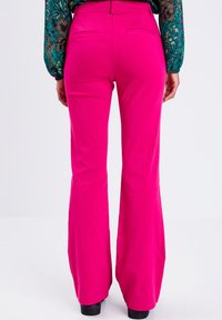 Cache Cache Pantalones - rose vif/fucsia neón - Zalando.es