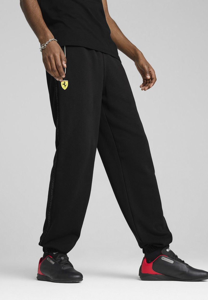 Puma SCUDERIA FERRARI RACE - Tracksuit bottoms - black - Zalando.ie