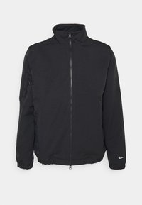 Nike Golf THERMAFIT UNSCRIPTED JACKET - Hardshell jacket - black/white ...