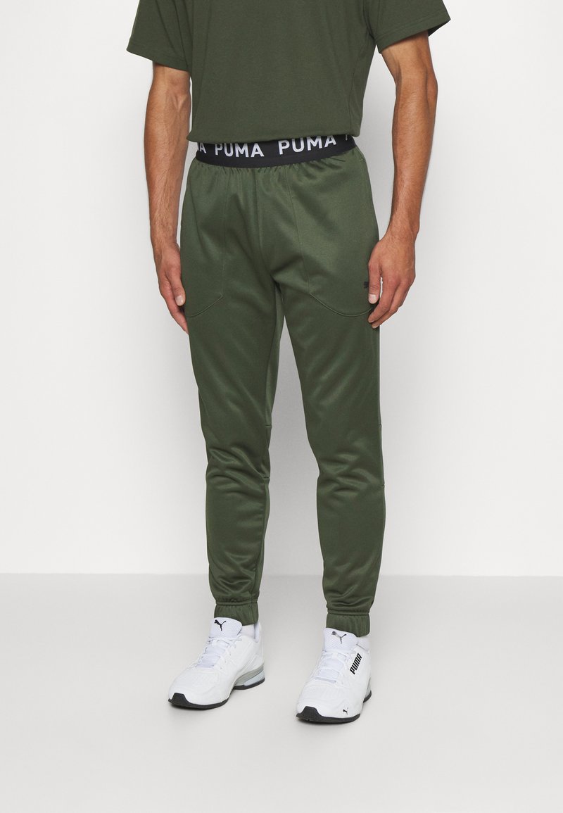 Puma TRAIN JOGGER - Tracksuit bottoms - myrtle/green - Zalando.co.uk