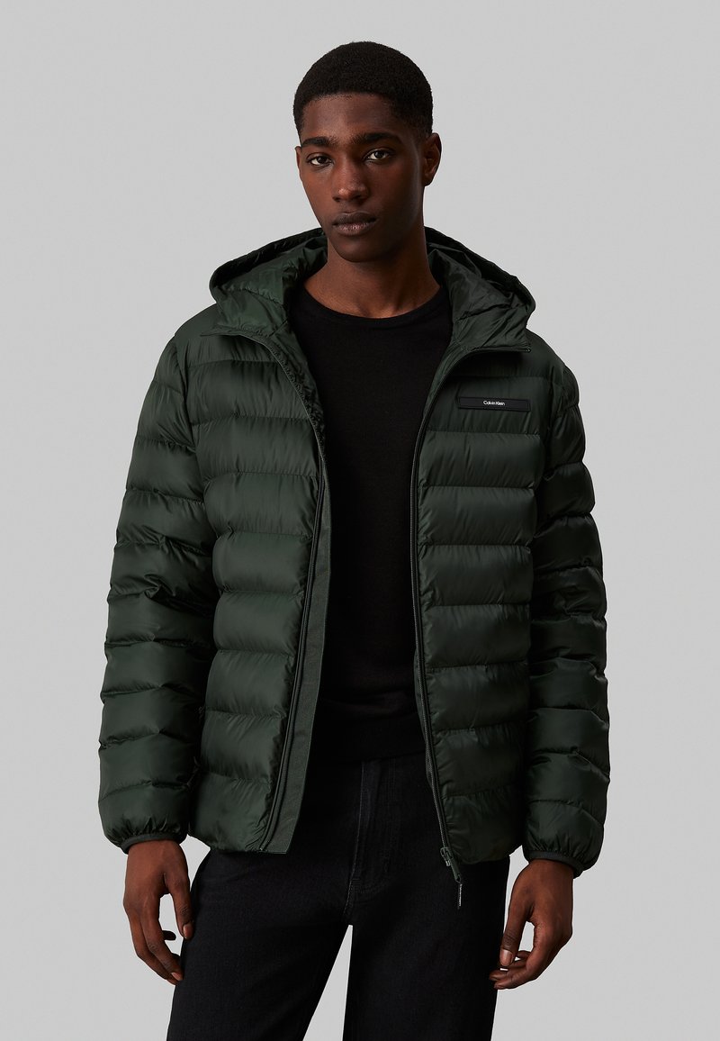 Calvin Klein HOODED PUFFER JACKET - Light jacket - midnight forest/dark ...