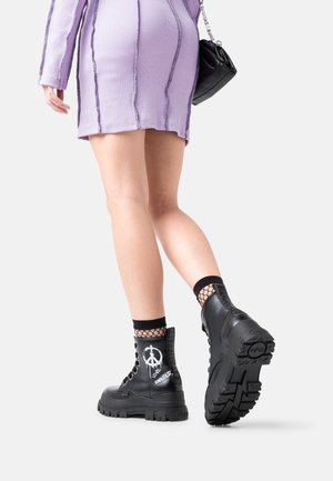 Buffalo VEGAN ASPHA MID - Stivaletti con plateau - black/nero - Zalando.it
