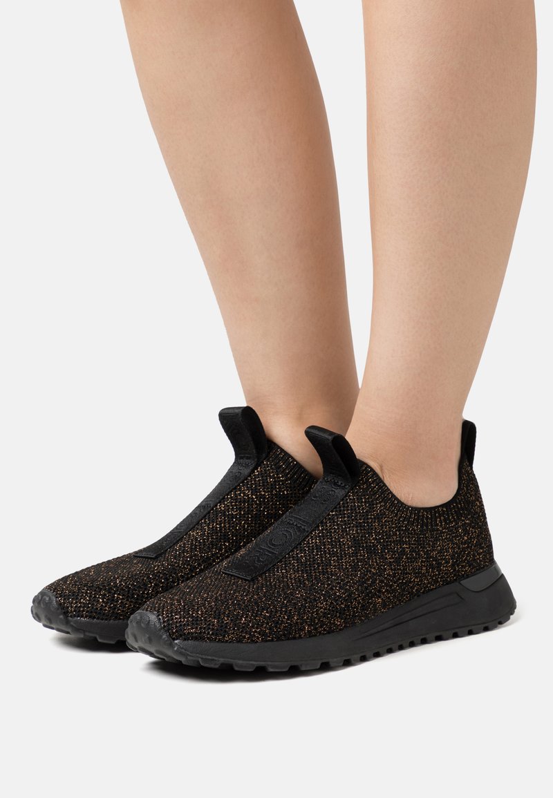 MICHAEL Michael Kors BODIE SLIP ON - Trainers - black/bronze/black ...