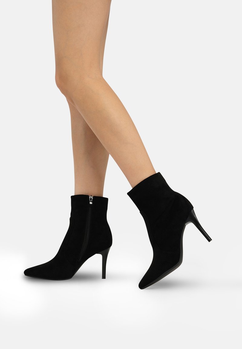 Stilvolle Stiefeletten Spitz Schwarz Bilder
