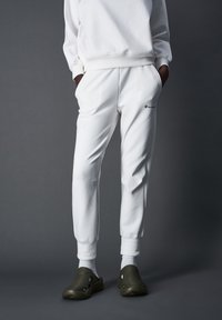 Champion TECH AMERICAN TECH - Jogginghose - offwhite - Zalando.at