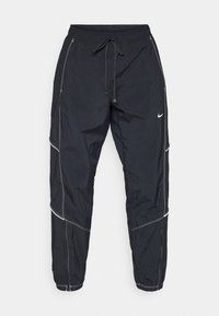 Nike Performance RETRO TRACK PANT - Tracksuit bottoms - black ...