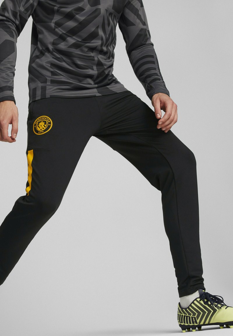 Puma Tracksuit bottoms - blackspectra yellow/black - Zalando