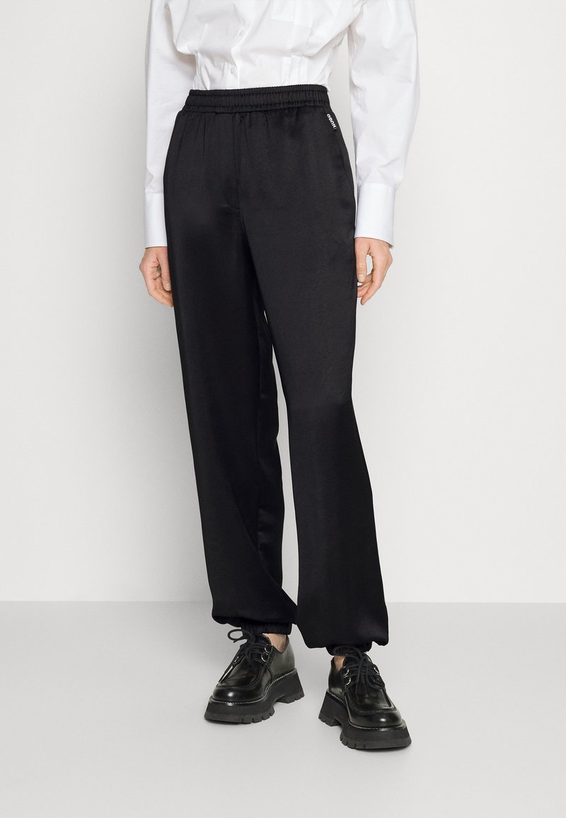 HUGO HAMAGA - Jogginghose - black/schwarz - Zalando.ch