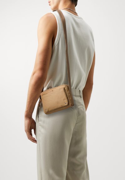 Levi's® WOMENS SMALL SHOULDER BAG - Käsilaukku - light blue ...