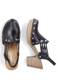 Rieker Clogs - schwarz - Zalando.de